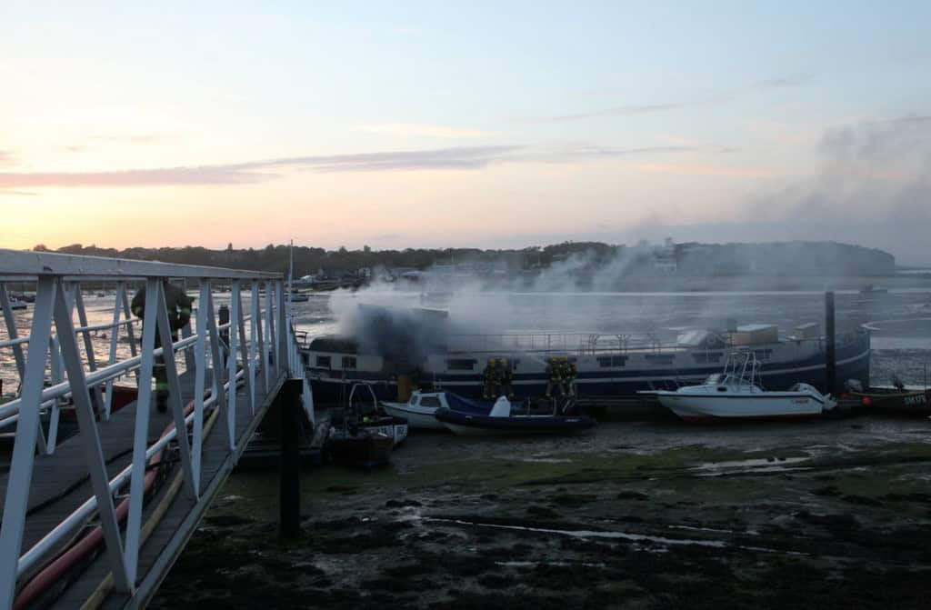 Fire crews tackle well alight barge fire